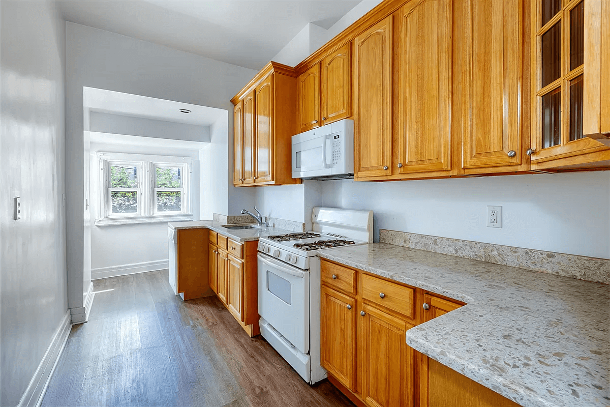 Bay Ridge Bow-Fronted House With Stained Glass, Wood Floors Asks $1.275 ...